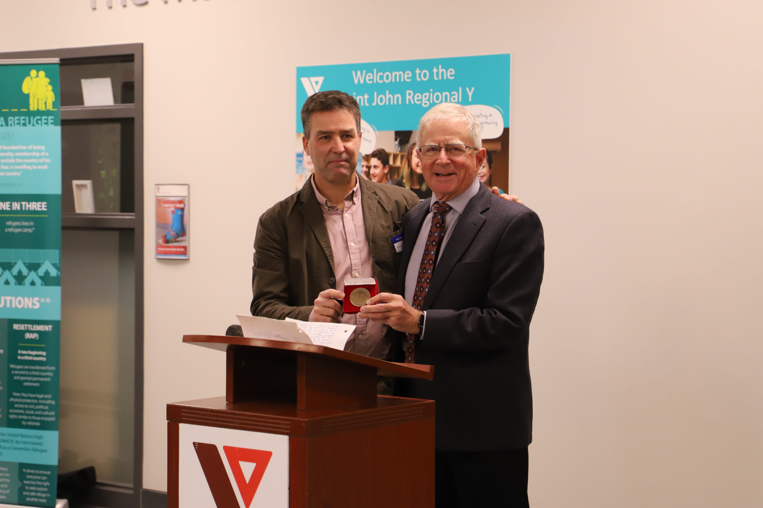 Dr. Duncan Webster receives the 2022 YMCA Peace Medal